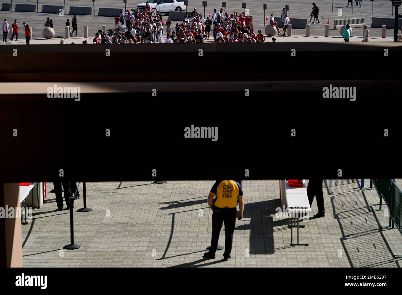 Fans wait to enter Angel Stadium for a baseball game between the Los ...