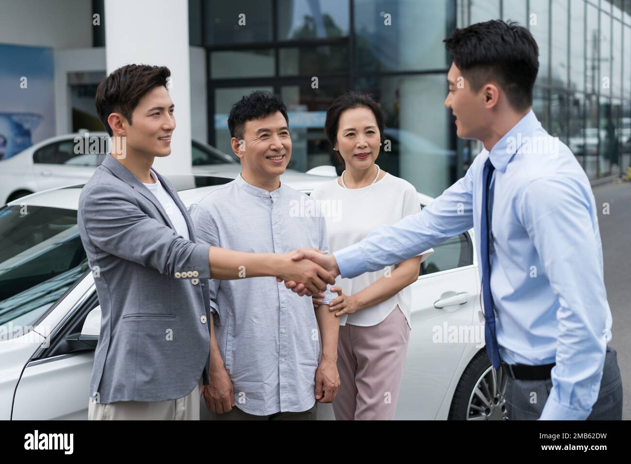 Three of choose and buy cars Stock Photo - Alamy