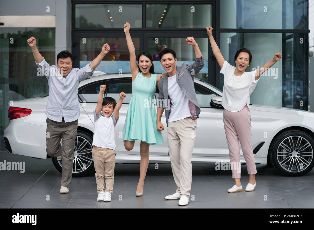 A family of choose and buy car Stock Photo - Alamy