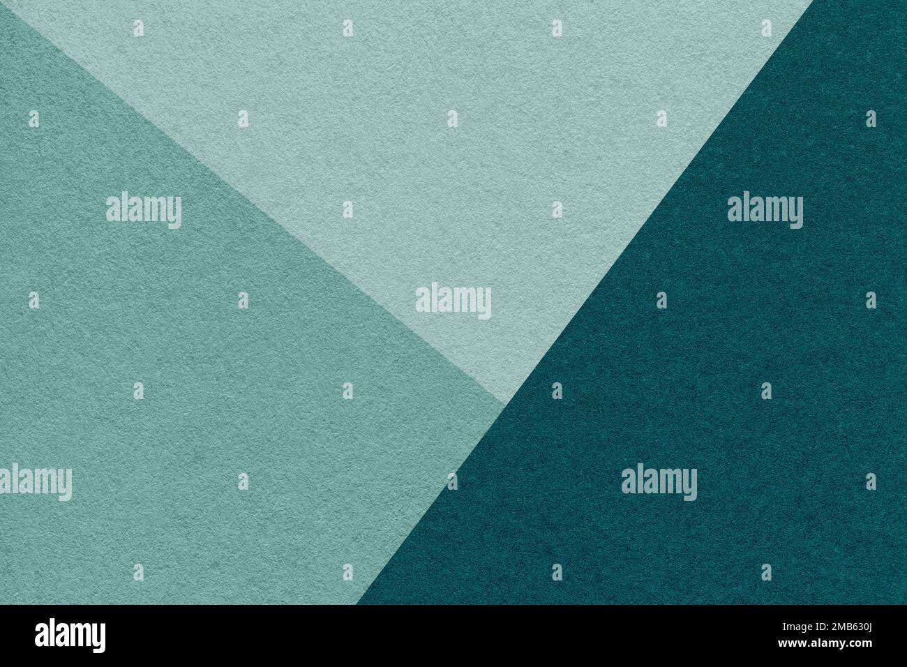 Texture of craft emerald and cyan shade color paper background, macro ...