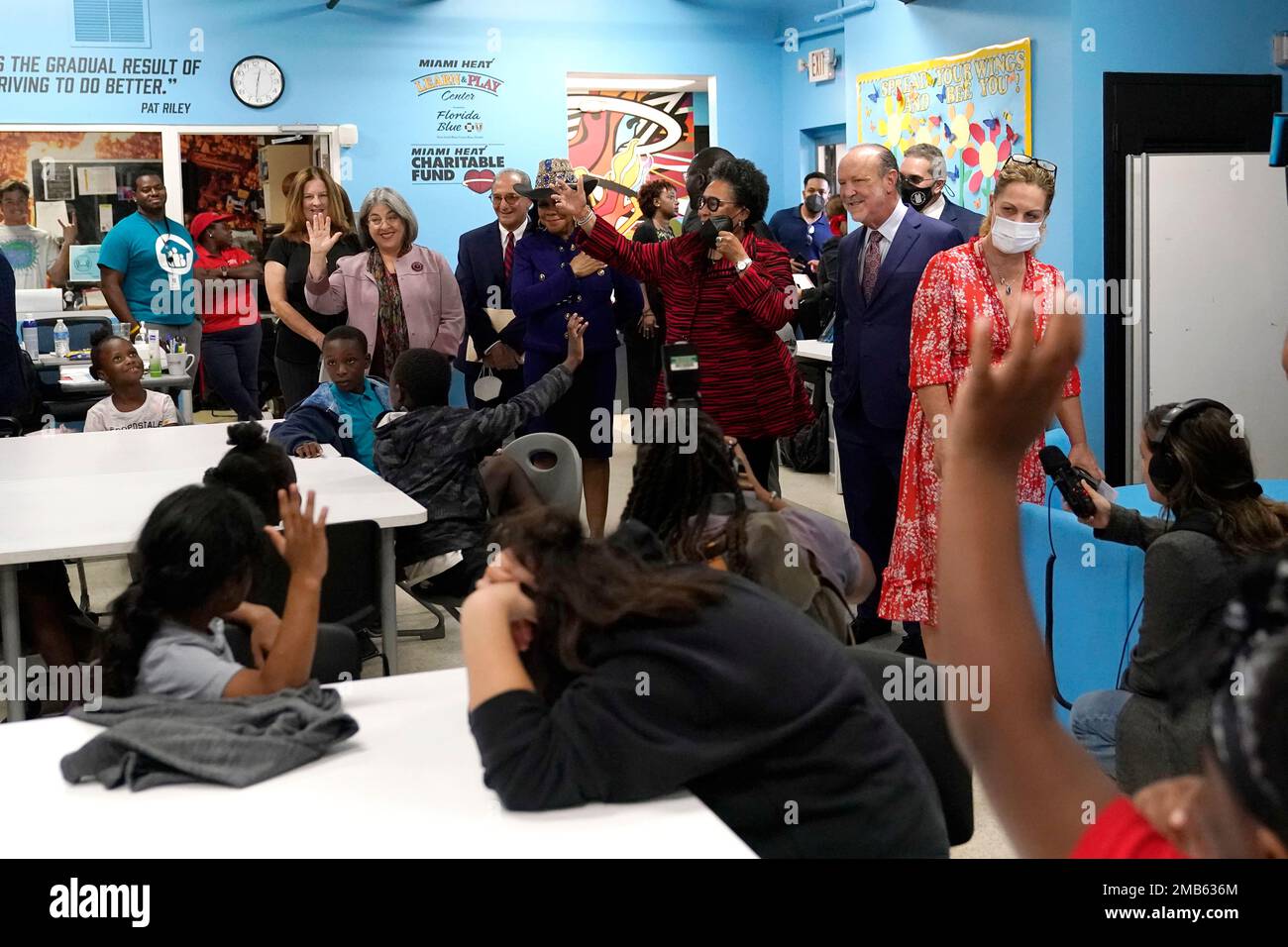Housing and Urban Development (HUD) Secretary Marcia Fudge, third from ...
