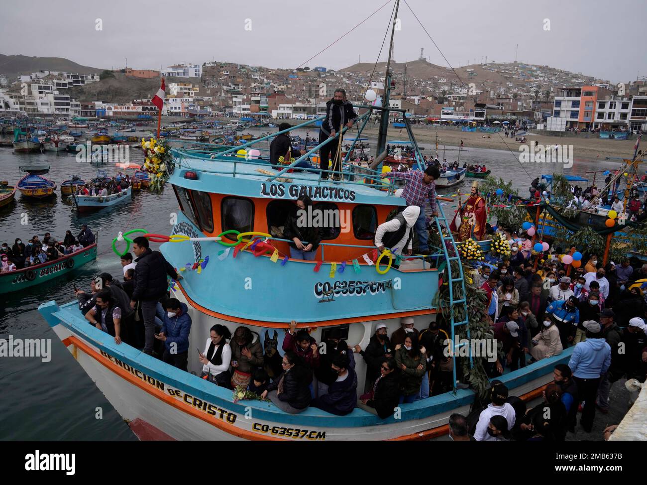 Devotees of Saint Peter, the Catholic patron Saint of fishermen, carry ...