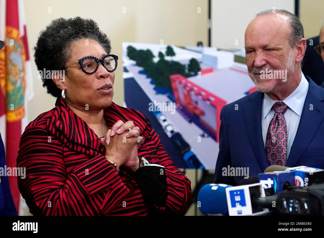 Housing and Urban Development (HUD) Secretary Marcia Fudge, left, speaks during a tour of the ...