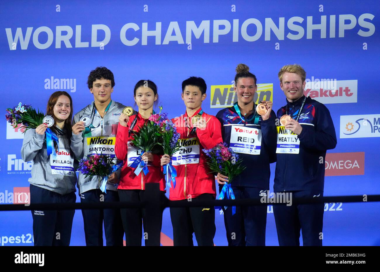 Silver medalist Chiara Pellacanni and Matteo Santoro from Italy, left ...