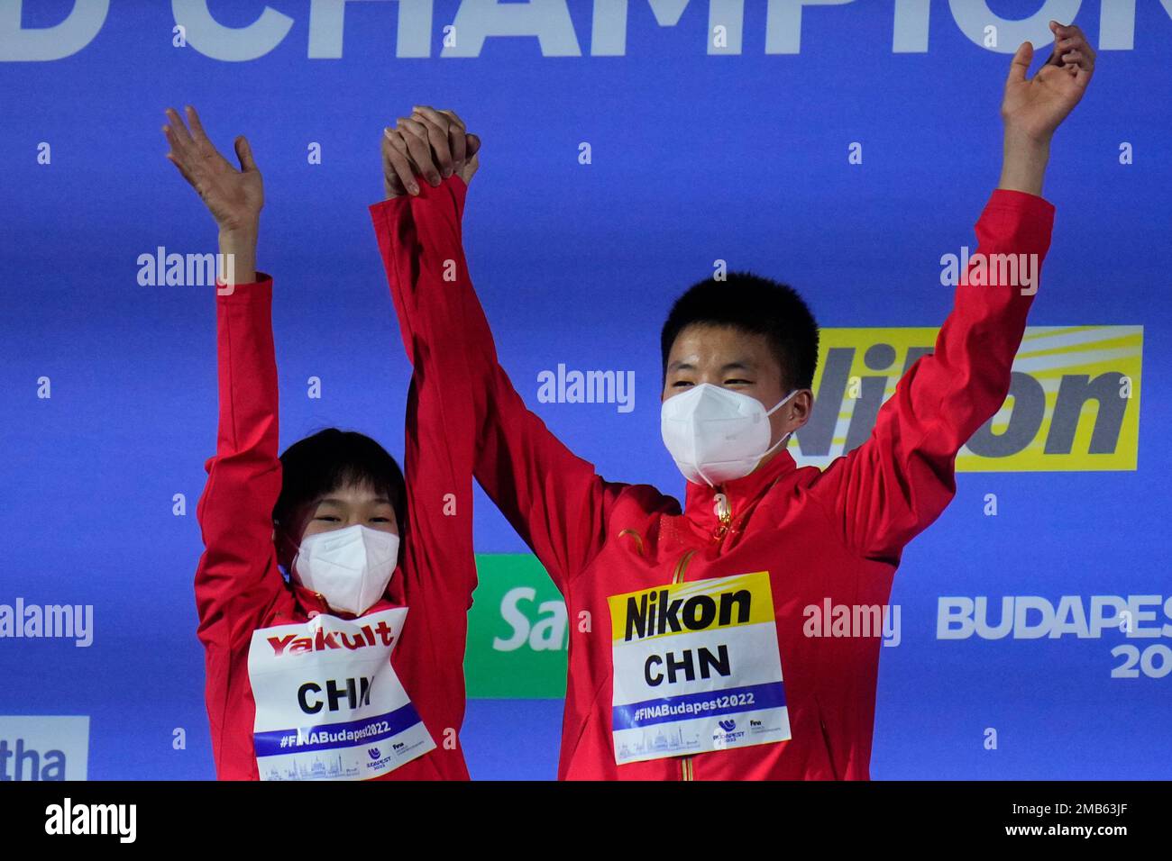 Quan Hongchan, left, and Bai Yuming of team China celebrate after ...