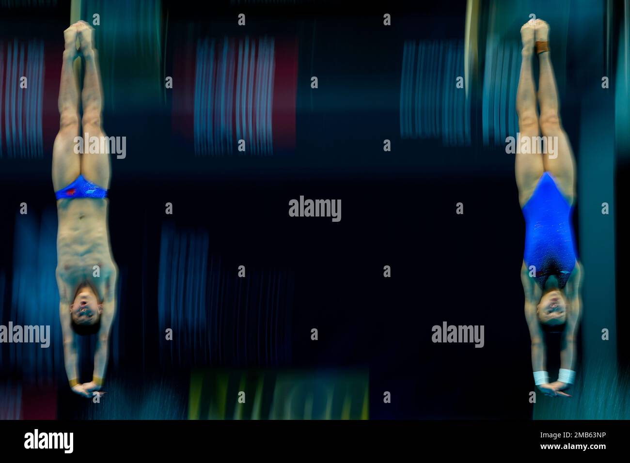 Zhu Zifeng and Lin Shan of China compete during the mixed diving ...