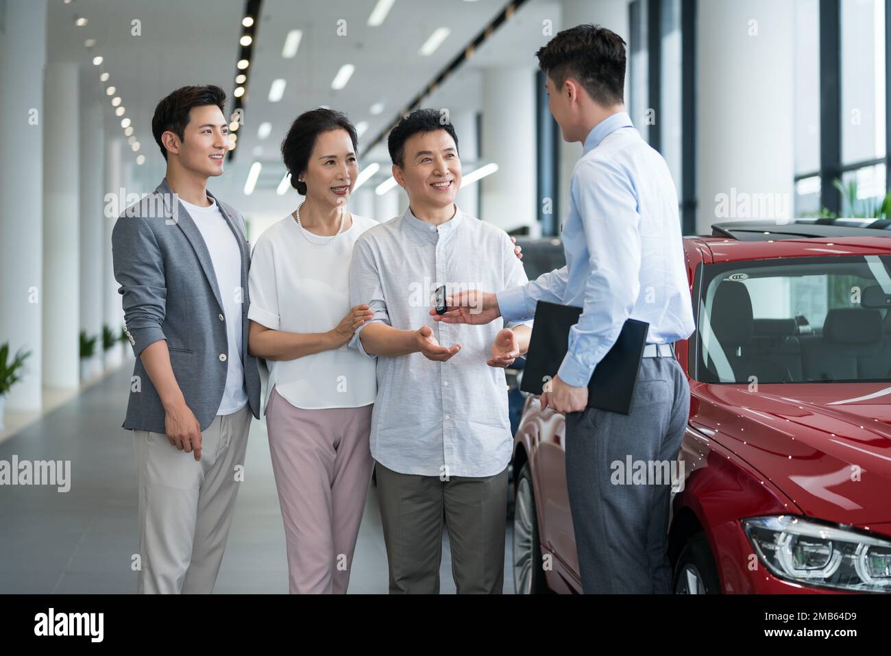 Three of choose and buy cars Stock Photo - Alamy