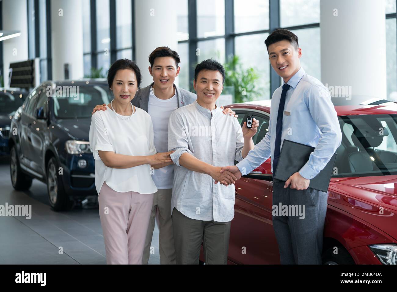Three of choose and buy cars Stock Photo - Alamy
