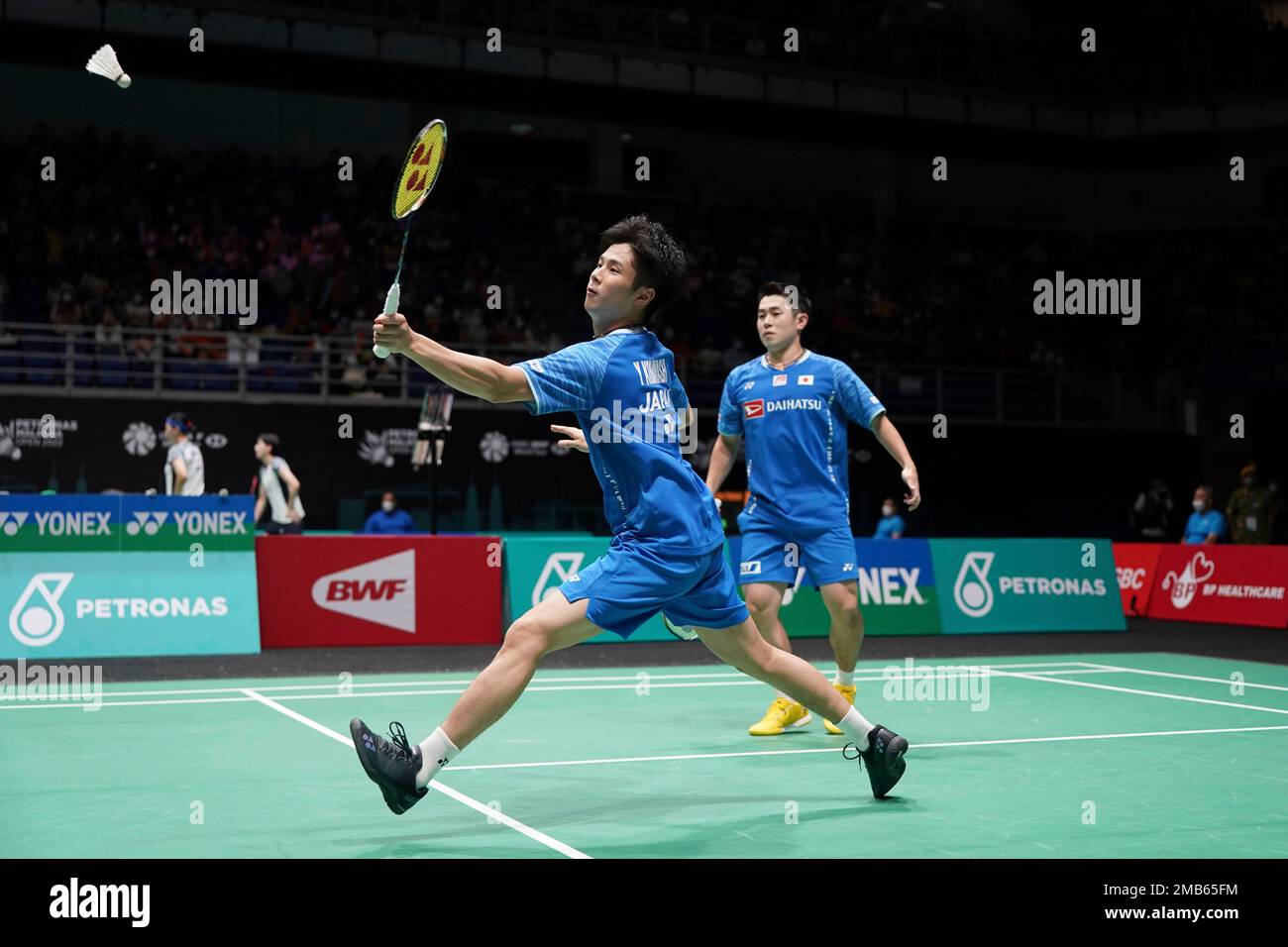 Japan's Yugo Kobayashi, left, and Takuro Hoki play against Taiwan's Lu ...