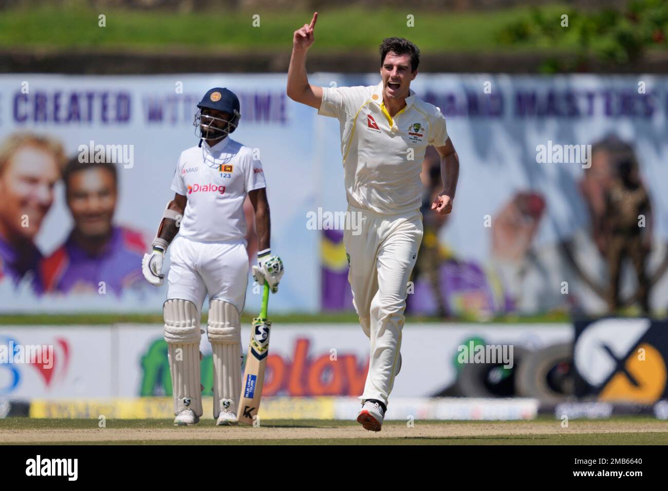 Australia's Pat Cummins celebrates taking the wicket of Sri Lanka's ...