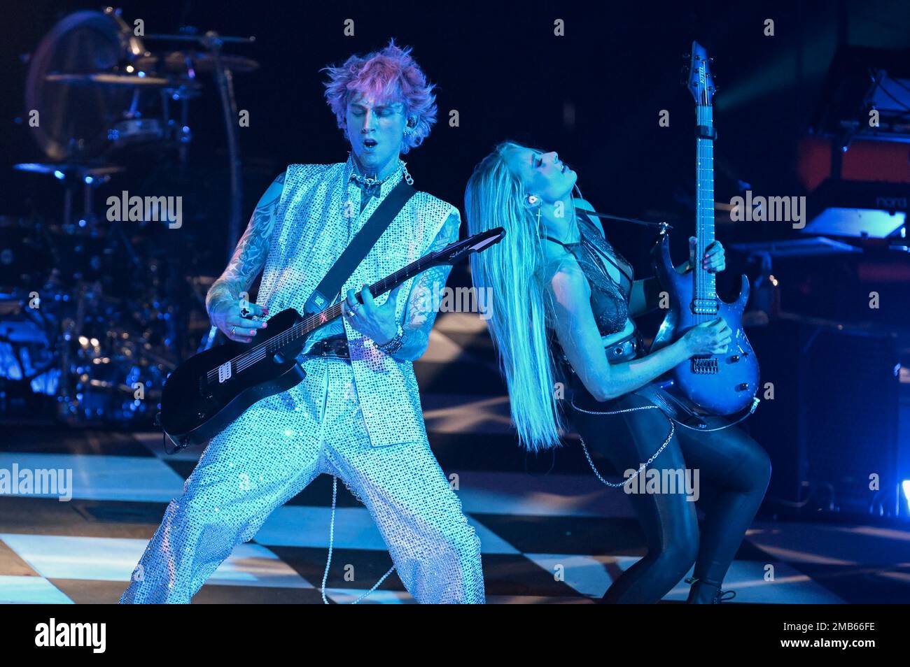 Machine Gun Kelly, left, and guitarist Sophie Lloyd perform at Madison ...