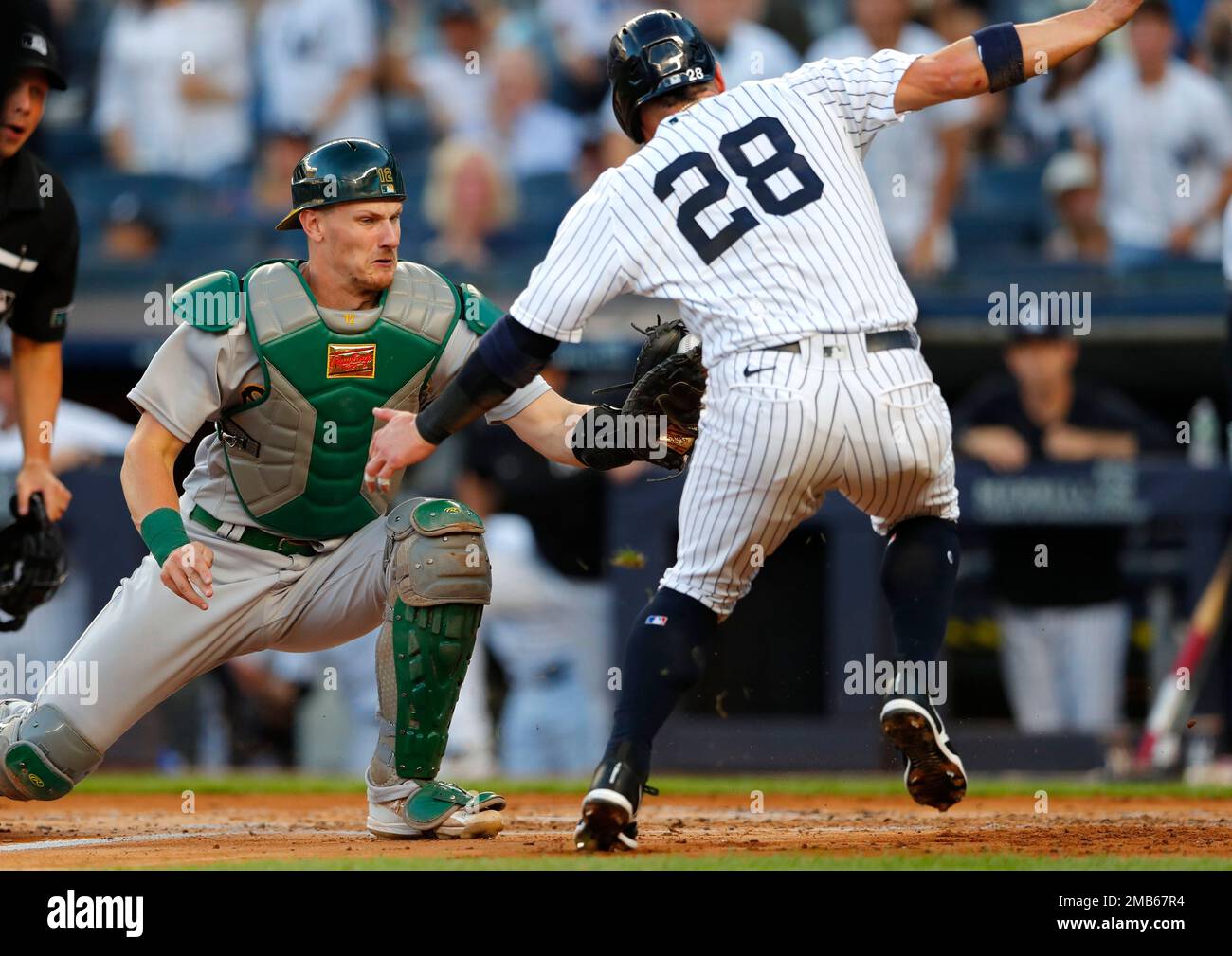 Oakland Athletics catcher Sean Murphy tags out New York Yankees' Josh ...