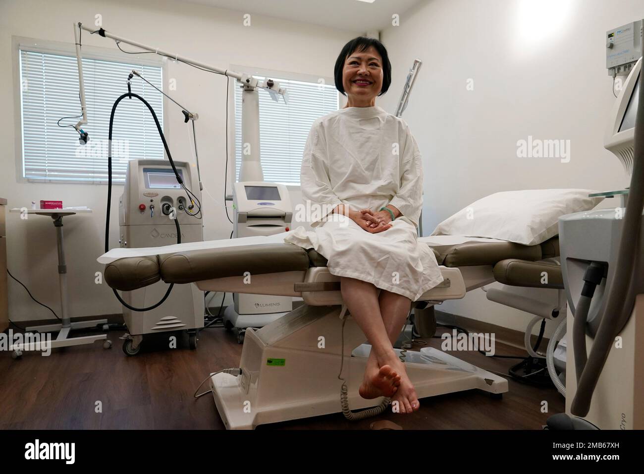 Kim Phuc waits to receive a laser treatment by Dr. Jill Waibel at the ...