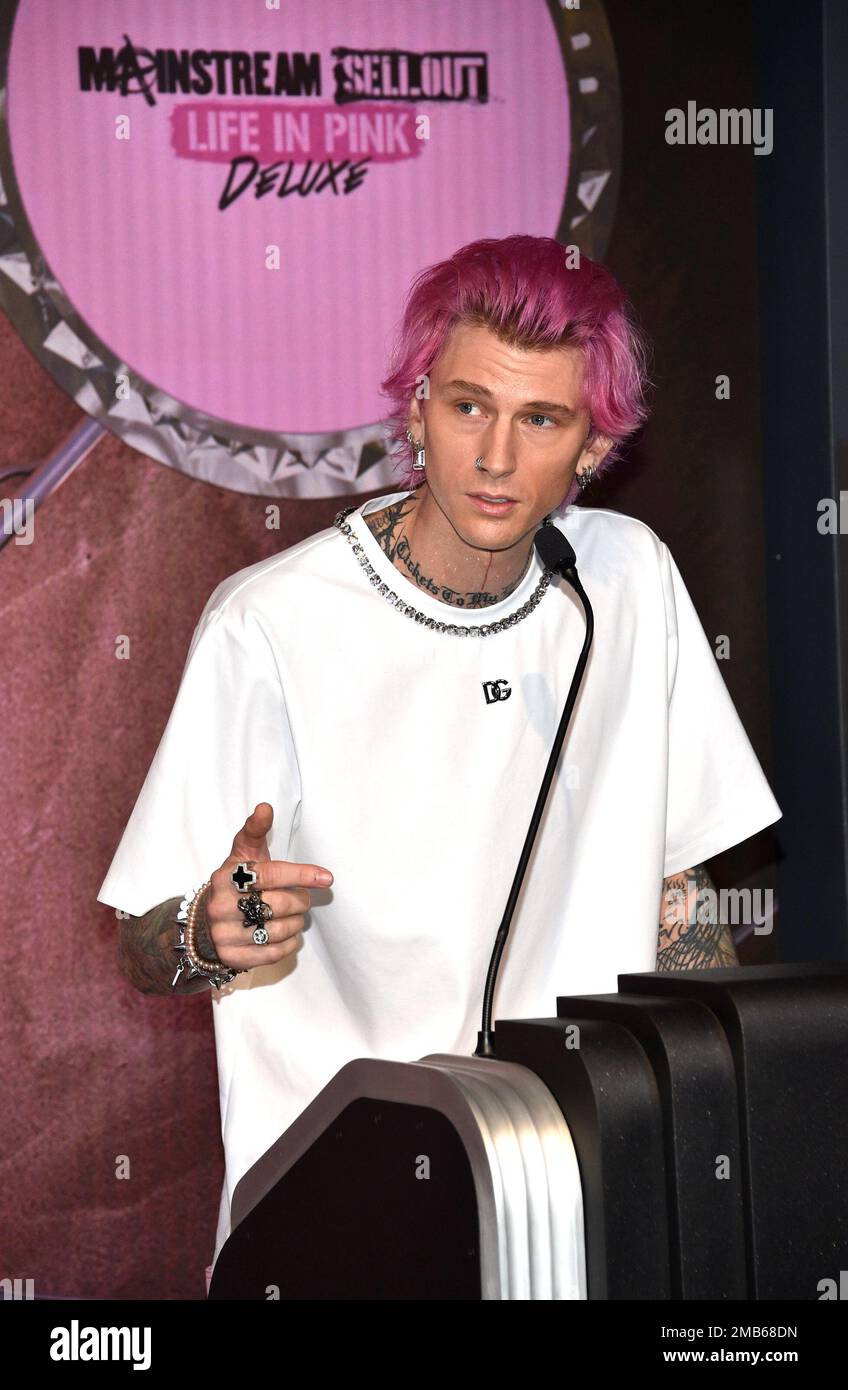 Machine Gun Kelly participates in a ceremonial lighting of the Empire ...