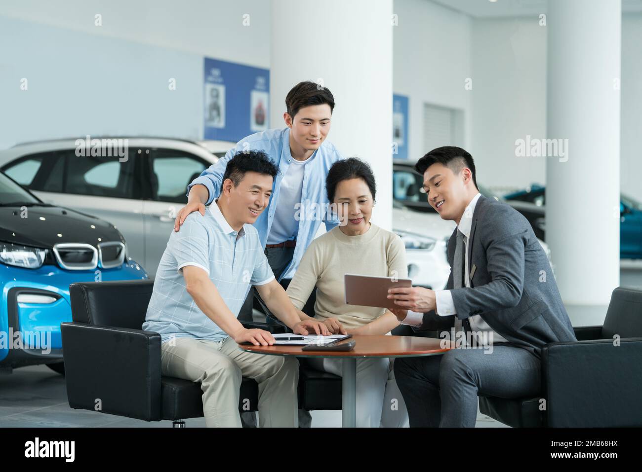 Three of choose and buy cars Stock Photo - Alamy