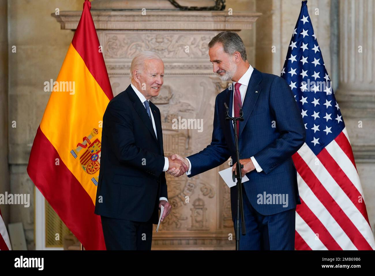President Joe Biden shakes hands with Spain's King Felipe VI at the ...