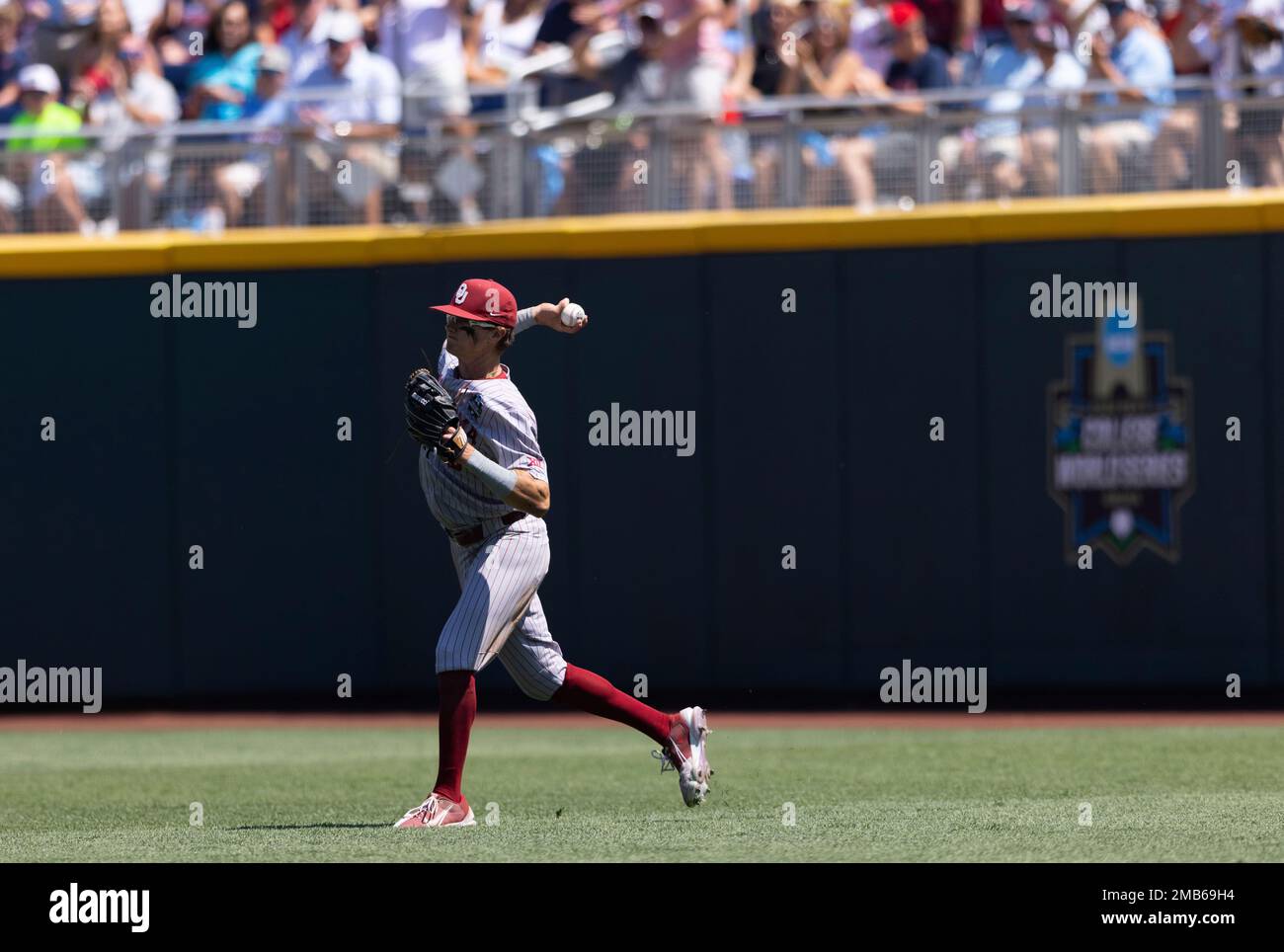 Oklahoma's John Spikerman fields a hit against Mississippi in Game 2 of ...