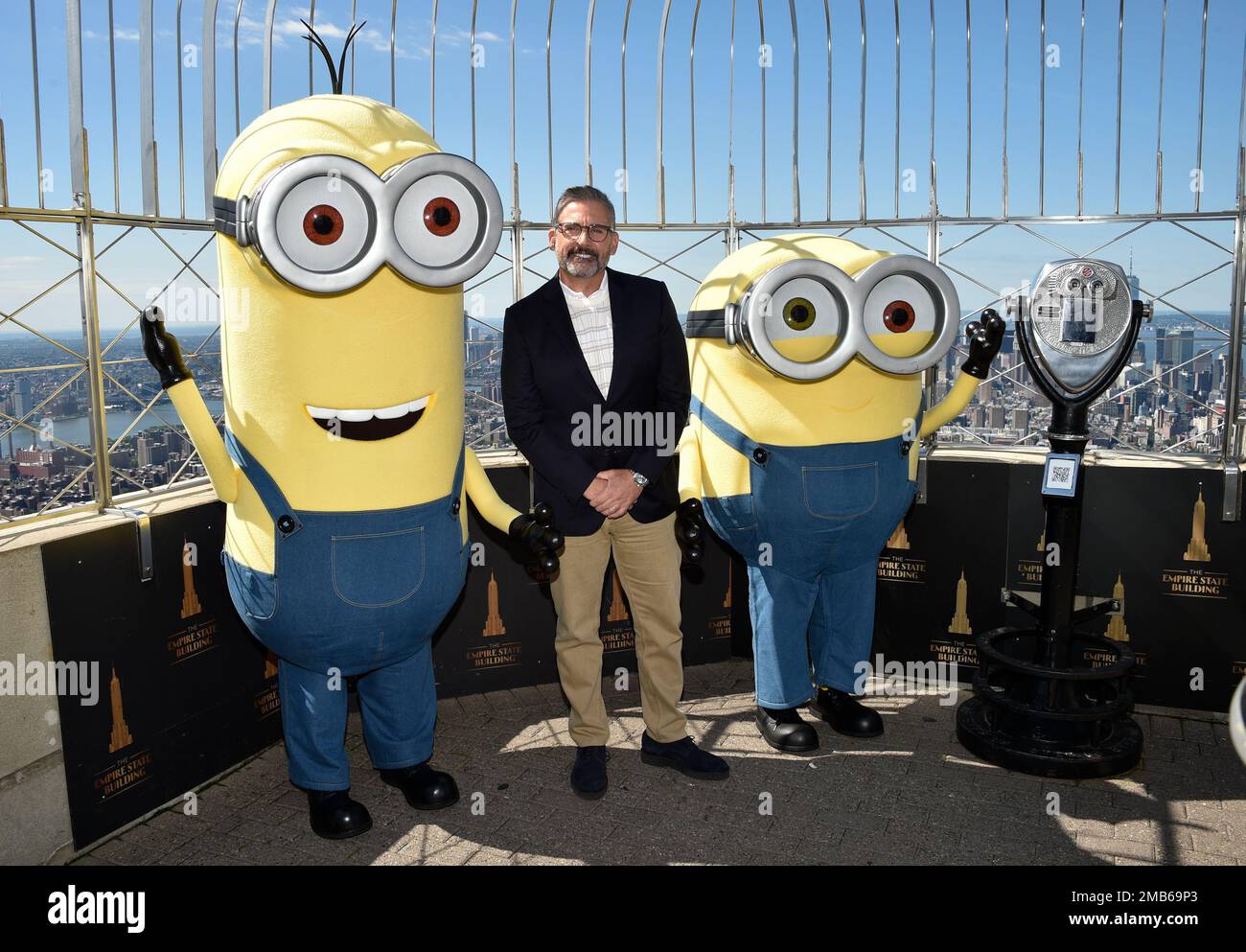 Actor Steve Carell and two Minion characters pose on the 86th floor ...