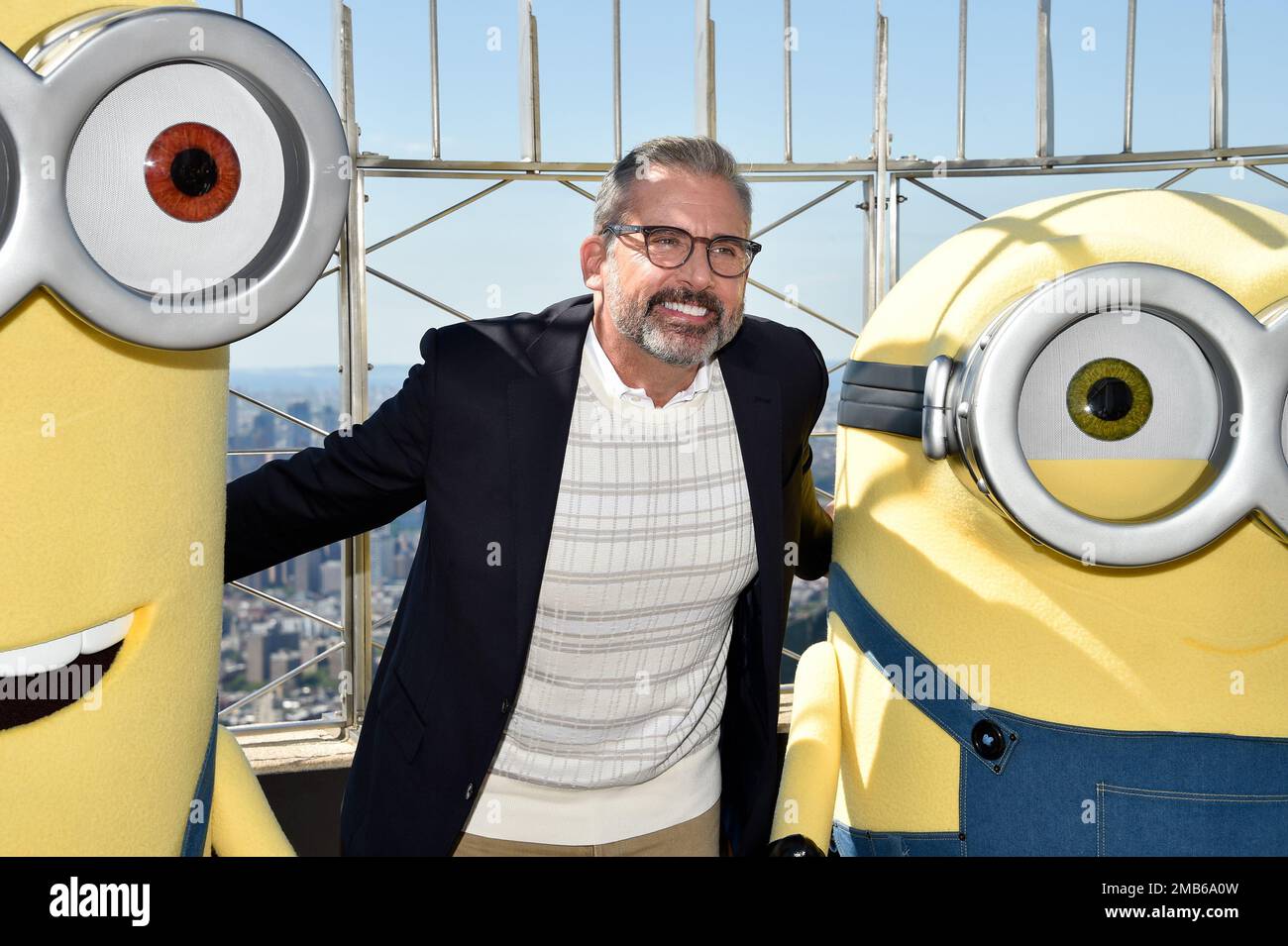 Actor Steve Carell and two Minion characters pose on the 86th floor ...