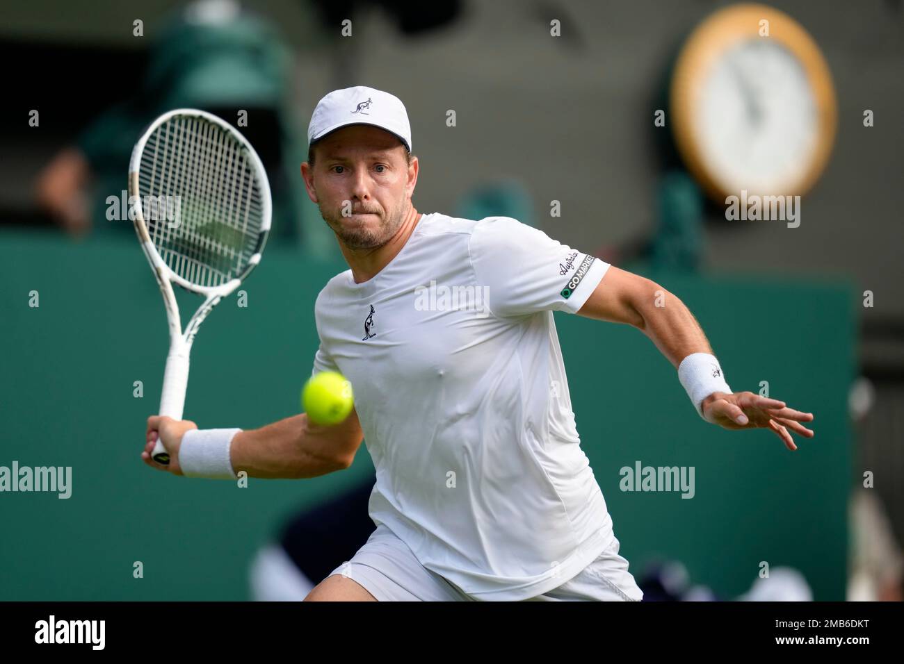 Australia's James Duckworth plays a return to Britain's Andy Murray in ...