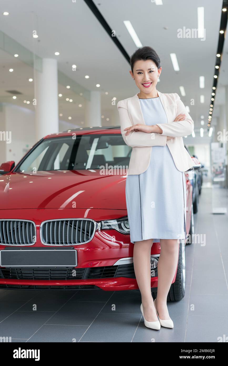 The choose and buy cars young business woman Stock Photo - Alamy