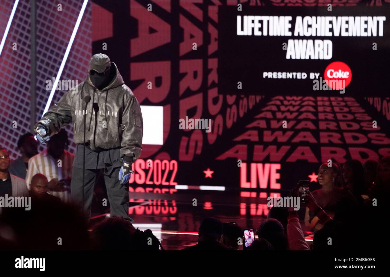 Kanye West, also known as Ye, presents the lifetime achievement award ...