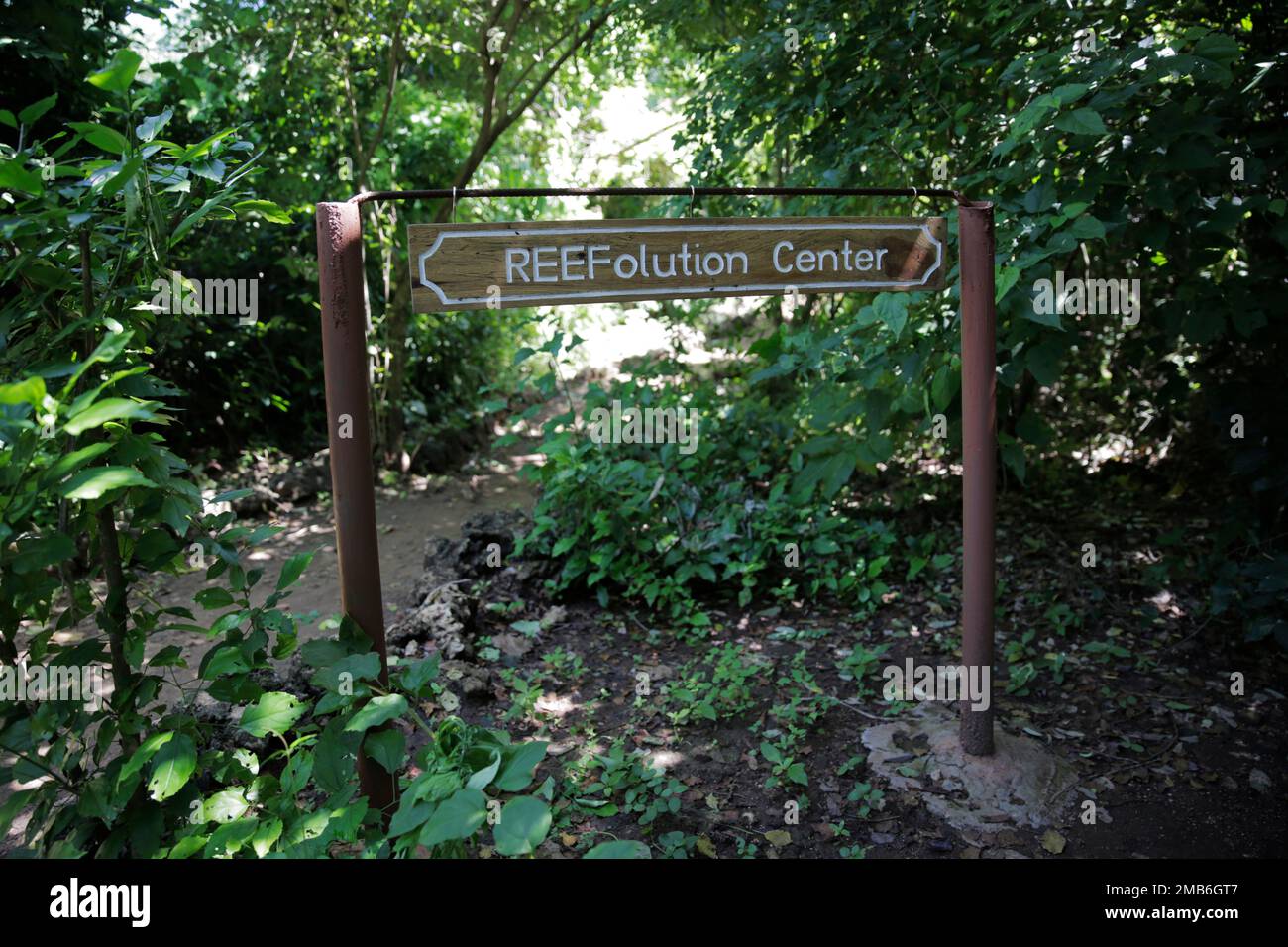 A sign is displayed for the REEFolution Center in Shimoni, Kenya on ...