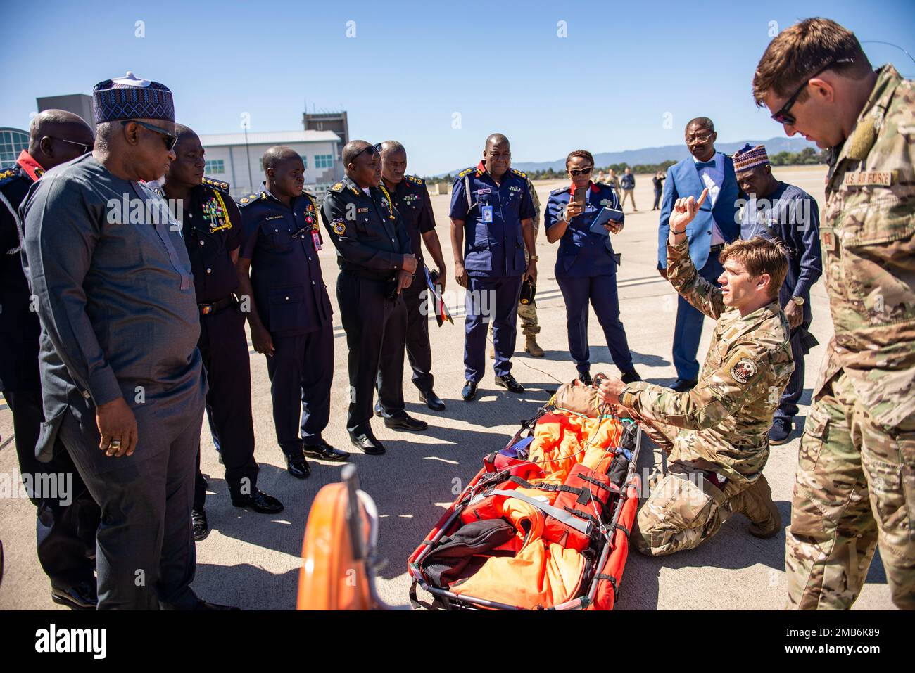 U.S. Air Force Pararescuemen (right) assigned with the 131st Rescue ...