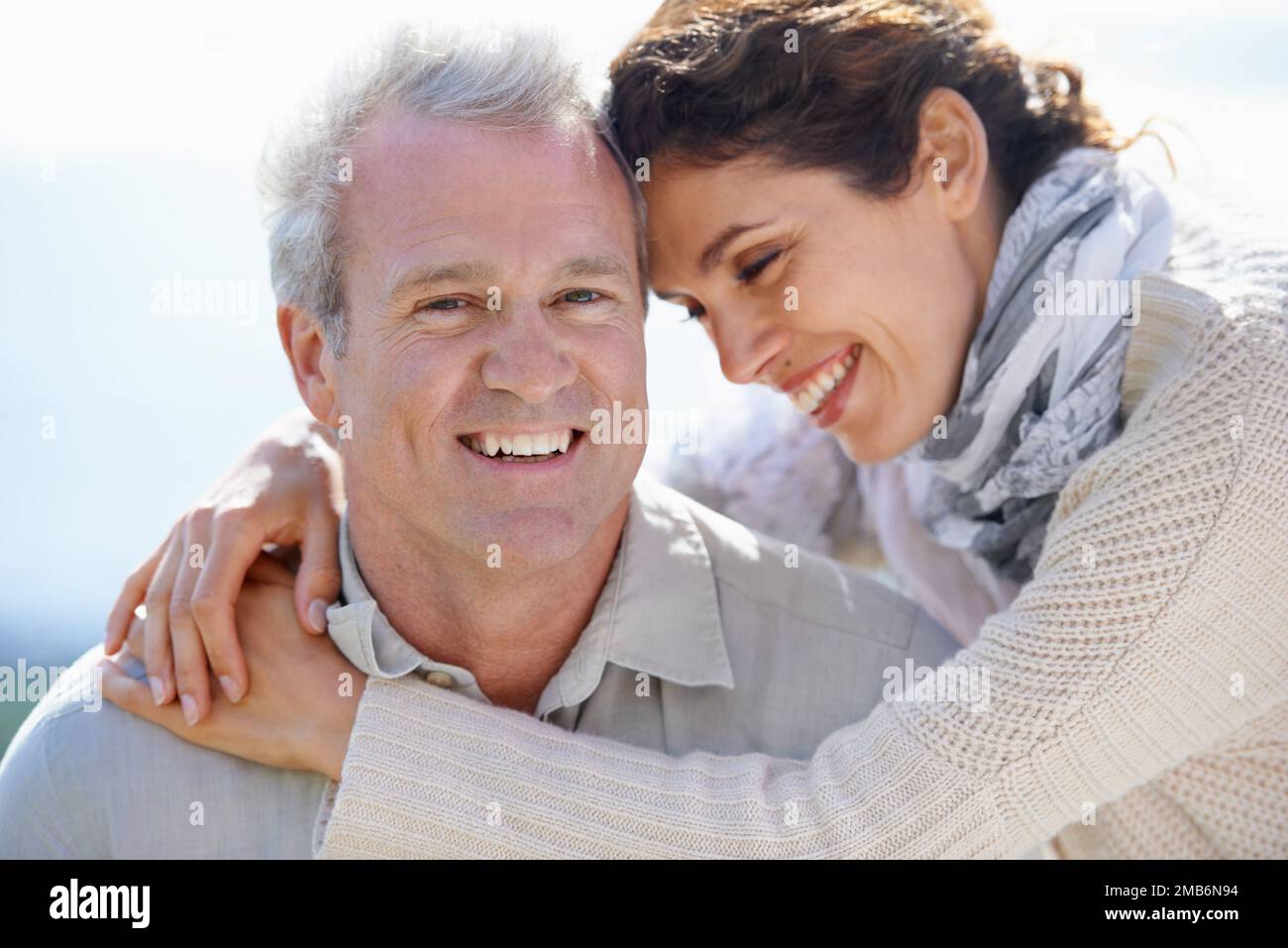 Appreciating one another. A happy mature couple with their heads ...