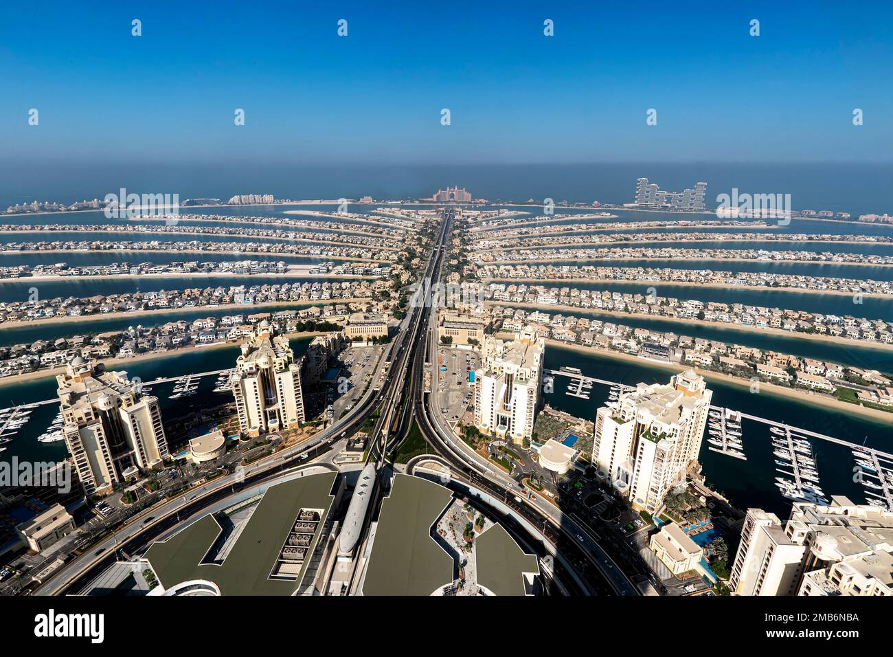 Aerial view of Palm Jumeirah Island timelapse. Evening top view with ...