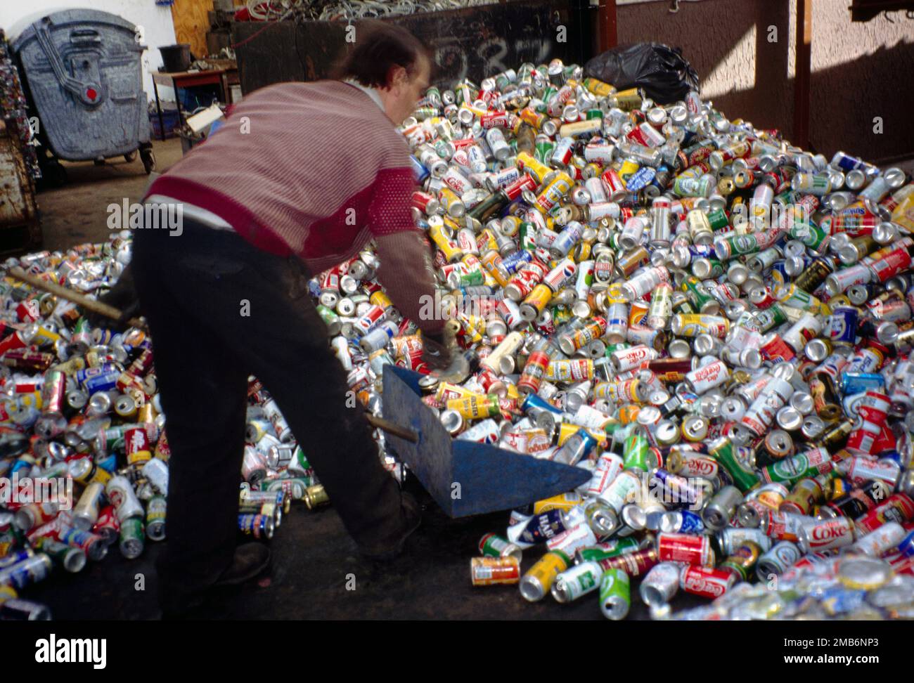 Man Sorting Aluminium Cans from Steel Cans At Recycling Centre Stock ...