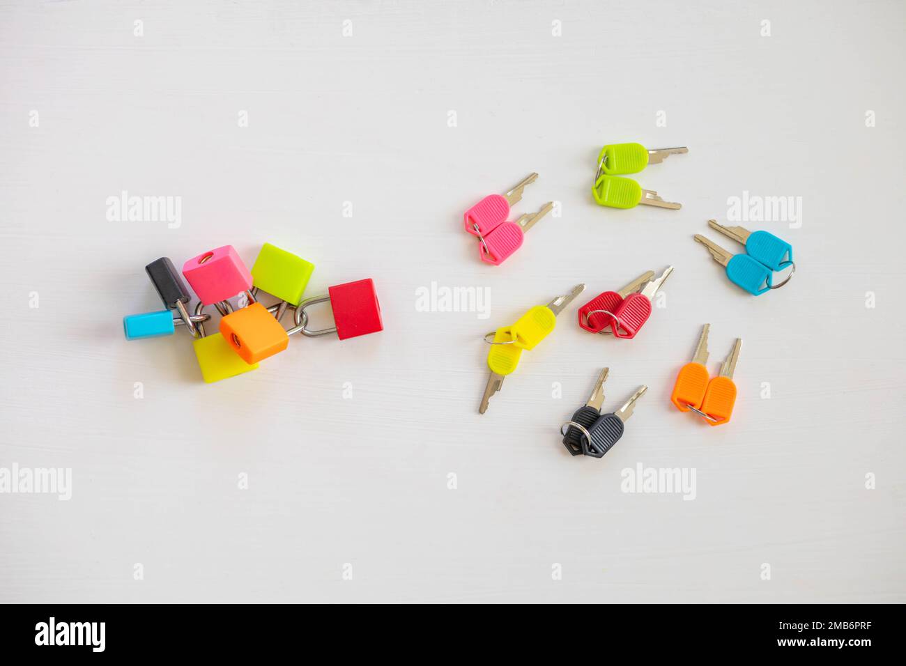 The child works with Montessori material with colored locks. Picks up ...