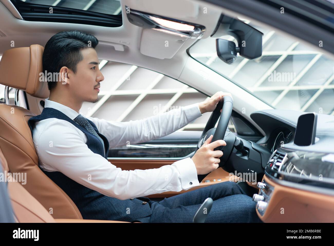 Business men driving Stock Photo - Alamy