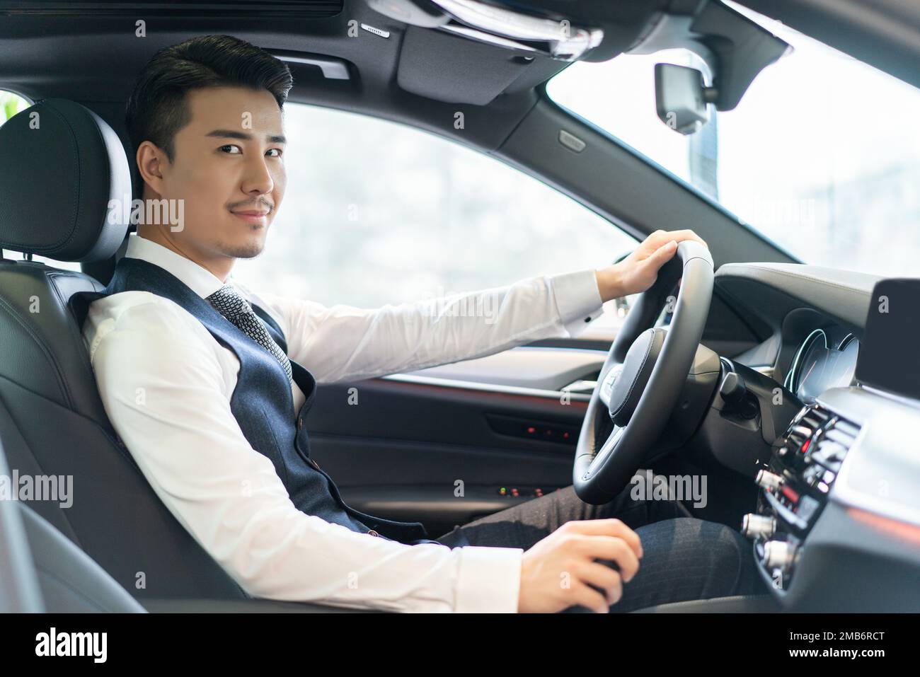 Business men driving Stock Photo - Alamy