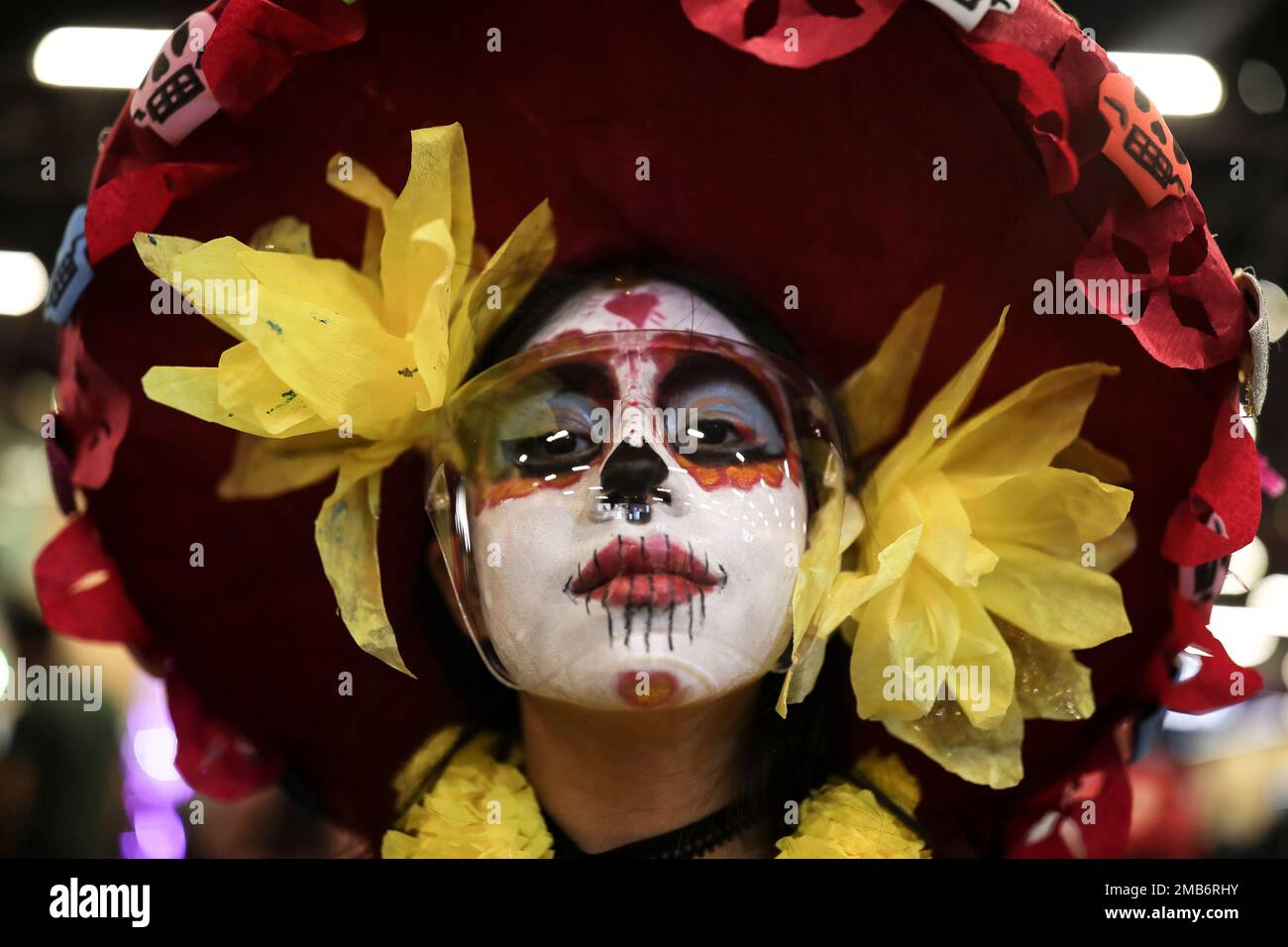 A cosplayer poses for a photo during a Comic Con convention in Bogota ...