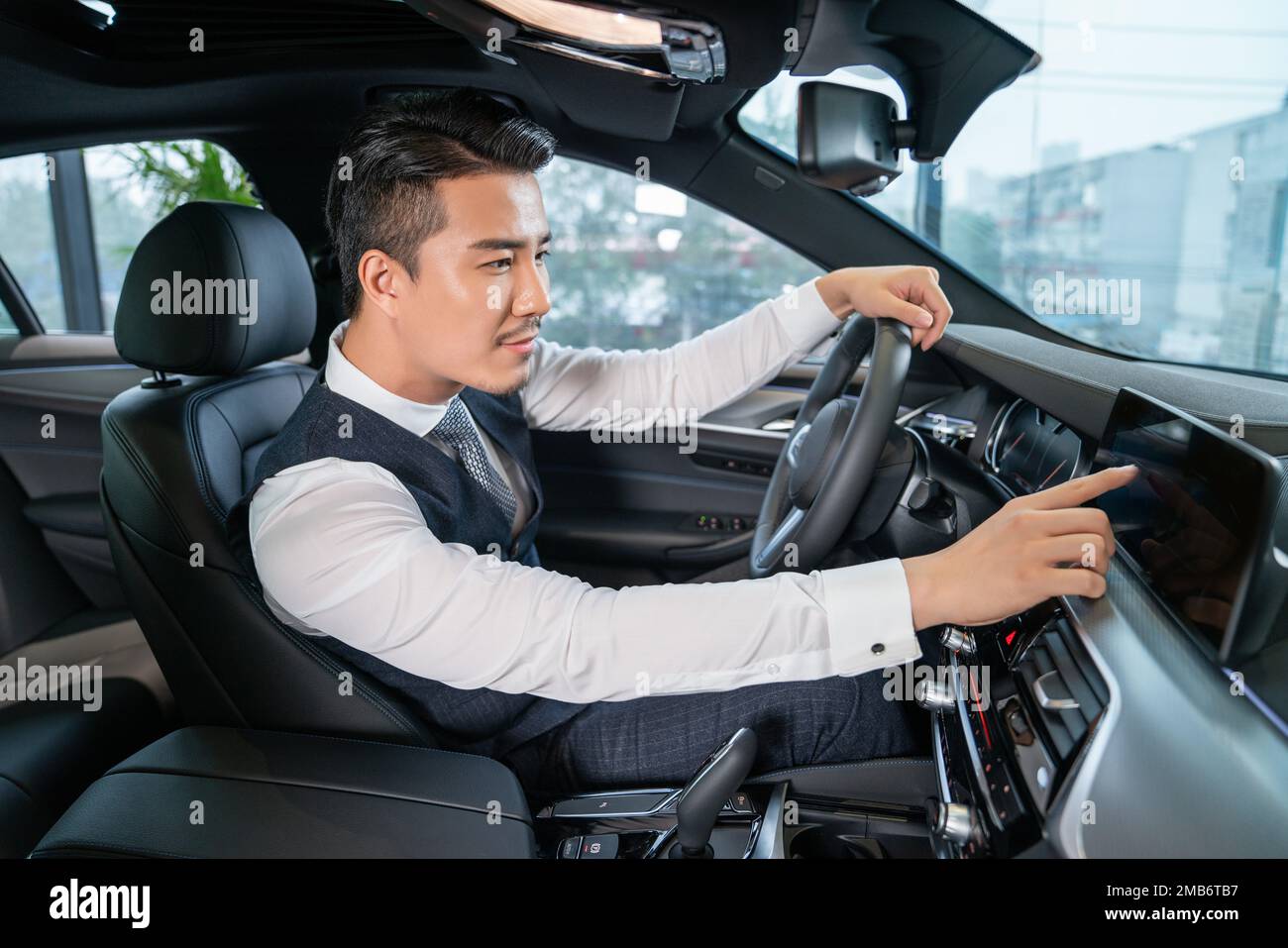 Business men driving Stock Photo - Alamy