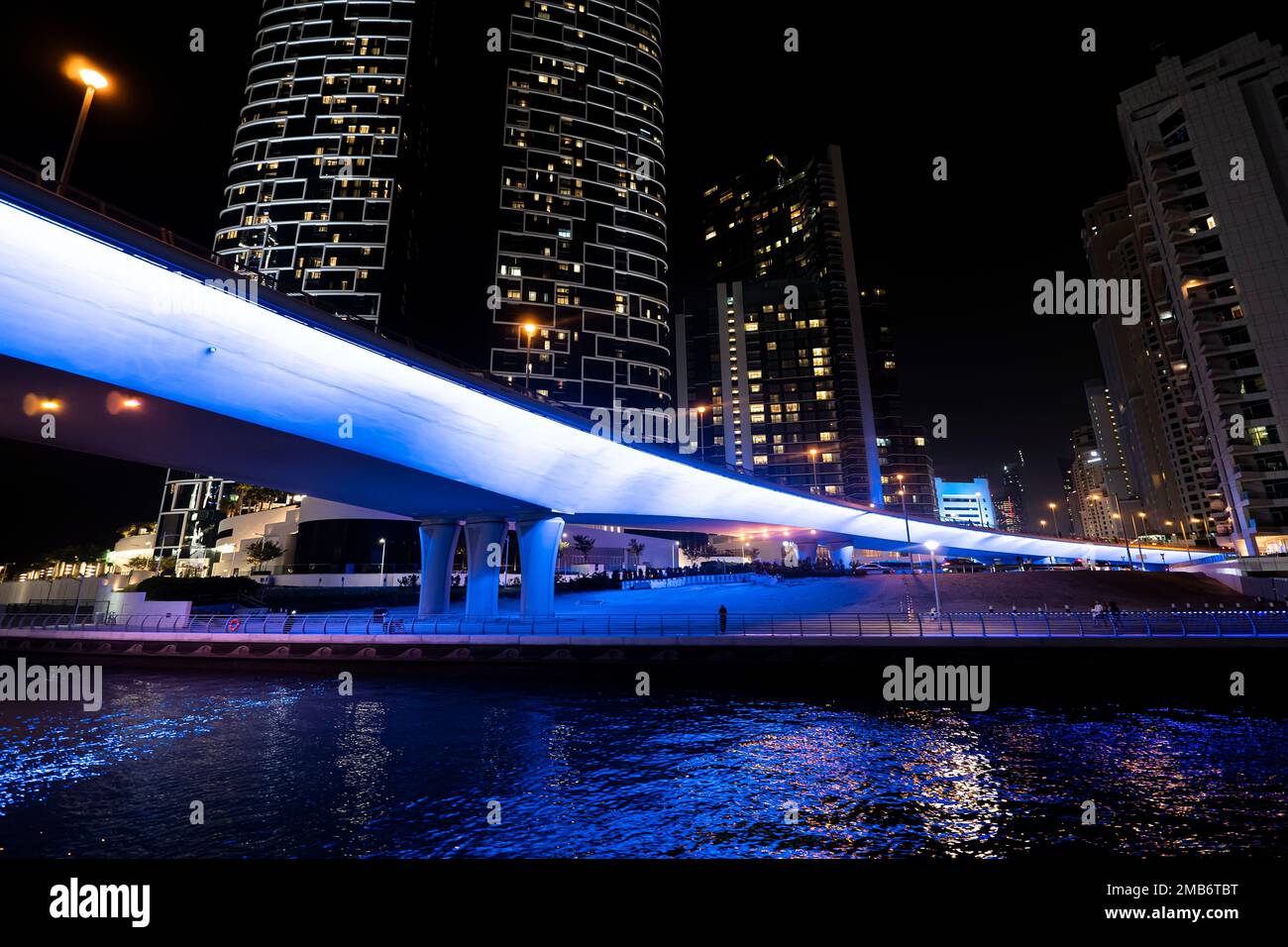 panoramic view of footbridge with tourists leading to numerous ...