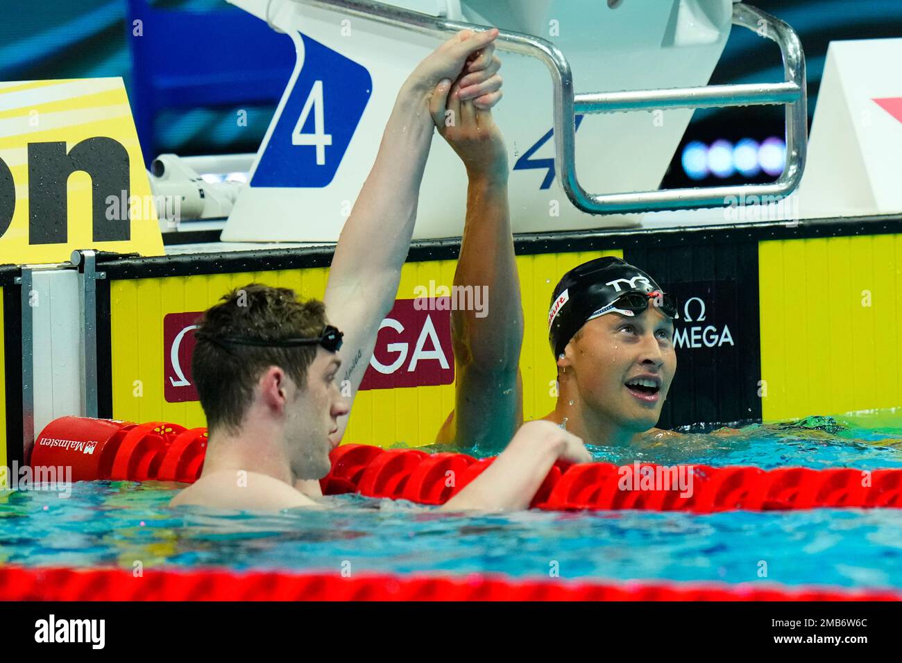 Hunter Armstrong, right, of the United States celebrates with Justin ...