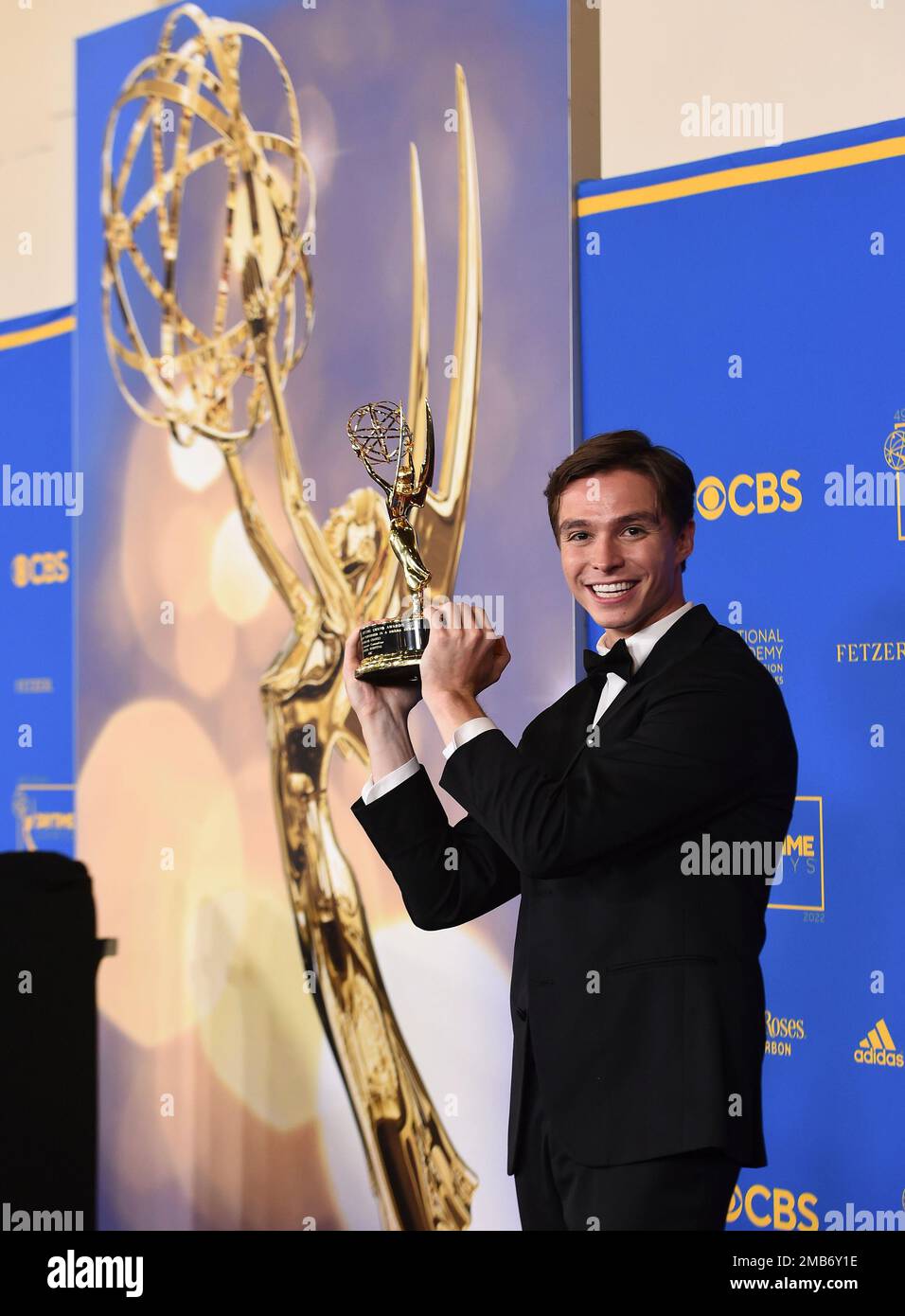 Nicholas Chavez poses in the press room with the award for outstanding ...