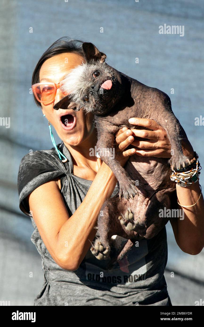 Jeneda Benally of Flagstaff, Ariz. poses for a photo with her dog Mr ...