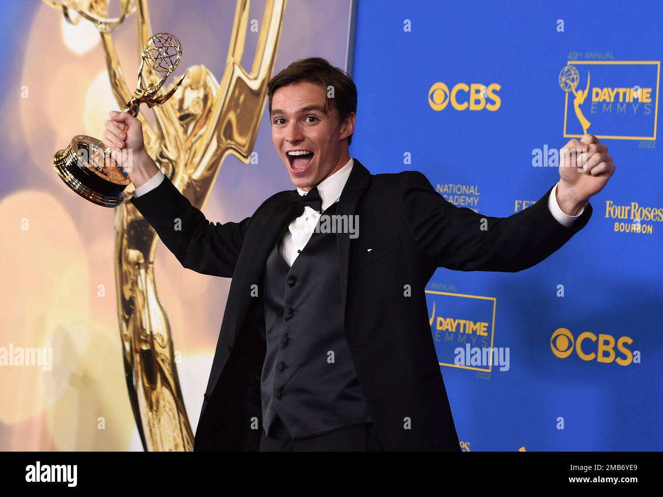 Nicholas Chavez poses in the press room with the award for outstanding ...