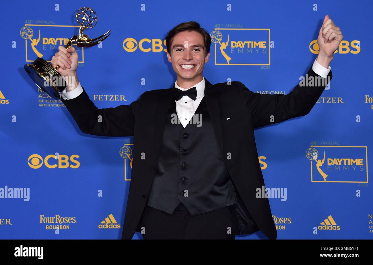 Nicholas Chavez poses in the press room with the award for outstanding ...