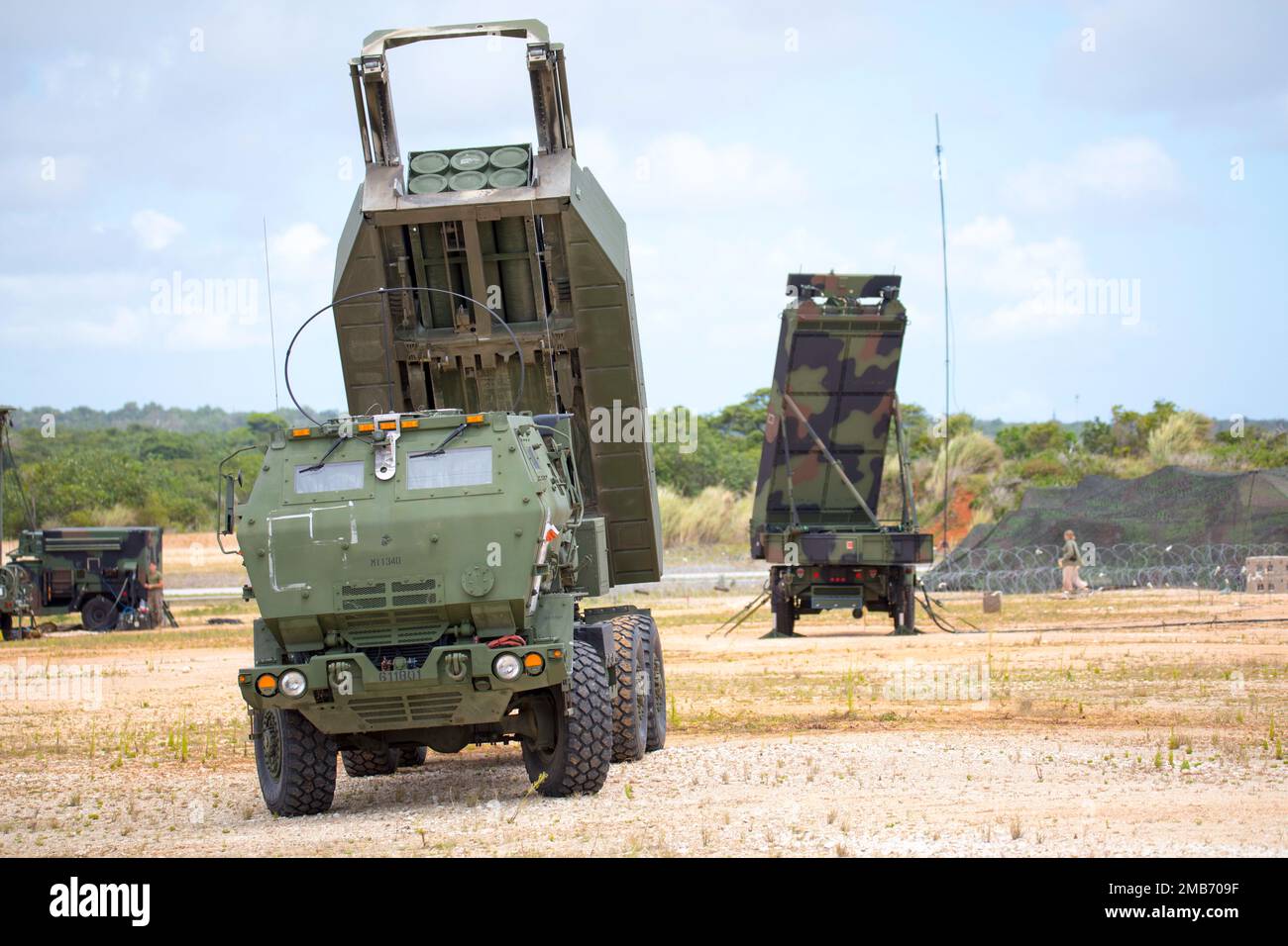 U.S. Marines with 5th Battalion, 11th Marine Regiment set up an M142 ...