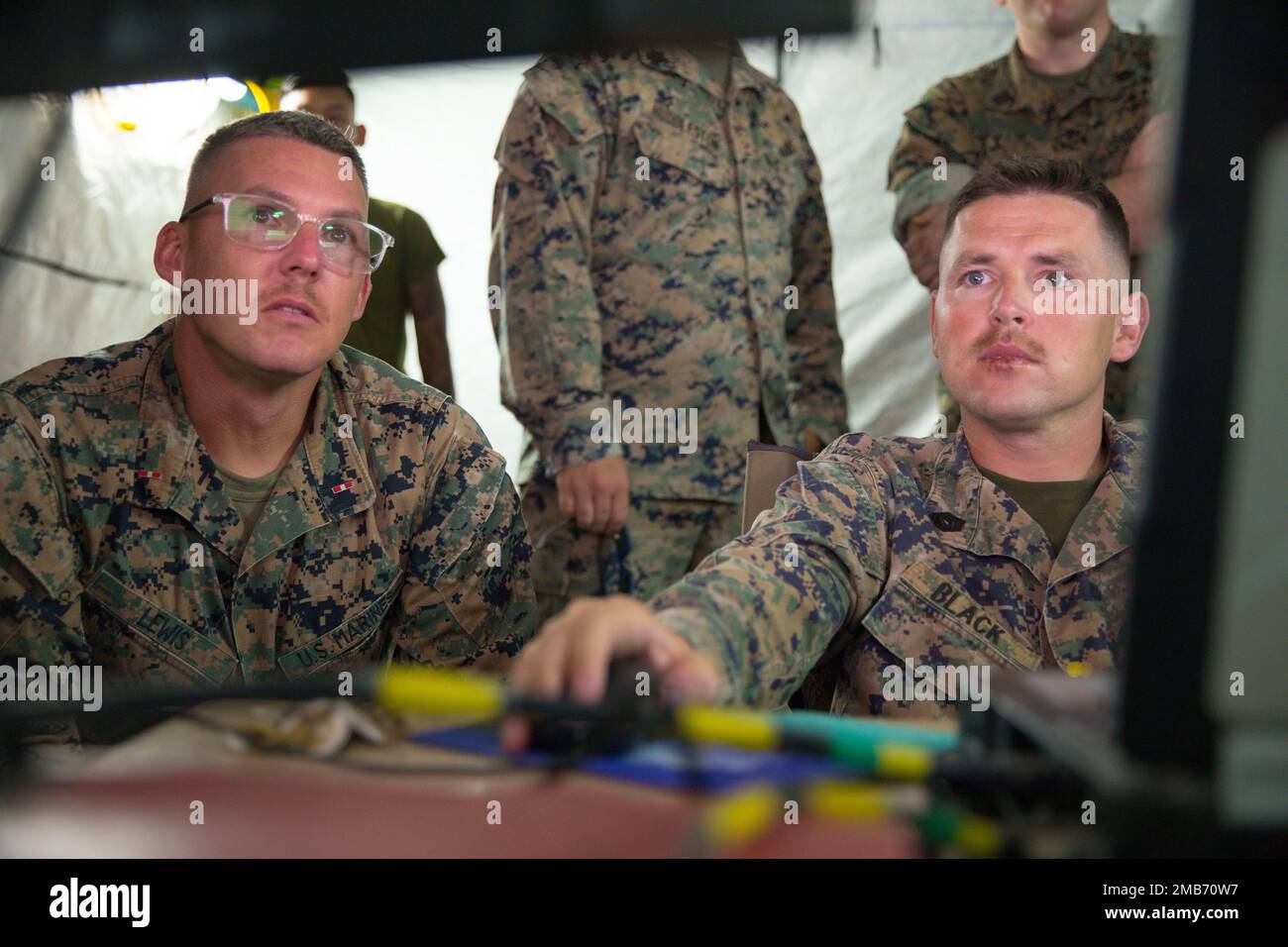 U.S. Marine Corps CWO3 Grant Lewis, an aviation radar systems ...