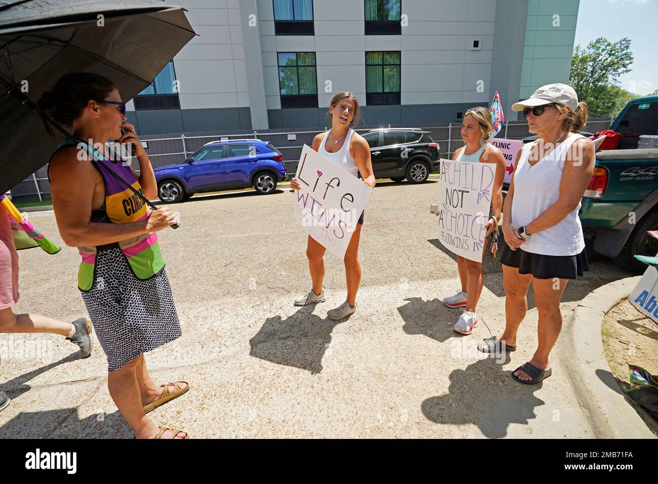 Abortion opponents Ella Maulding, center, Chloe Carter, second from ...