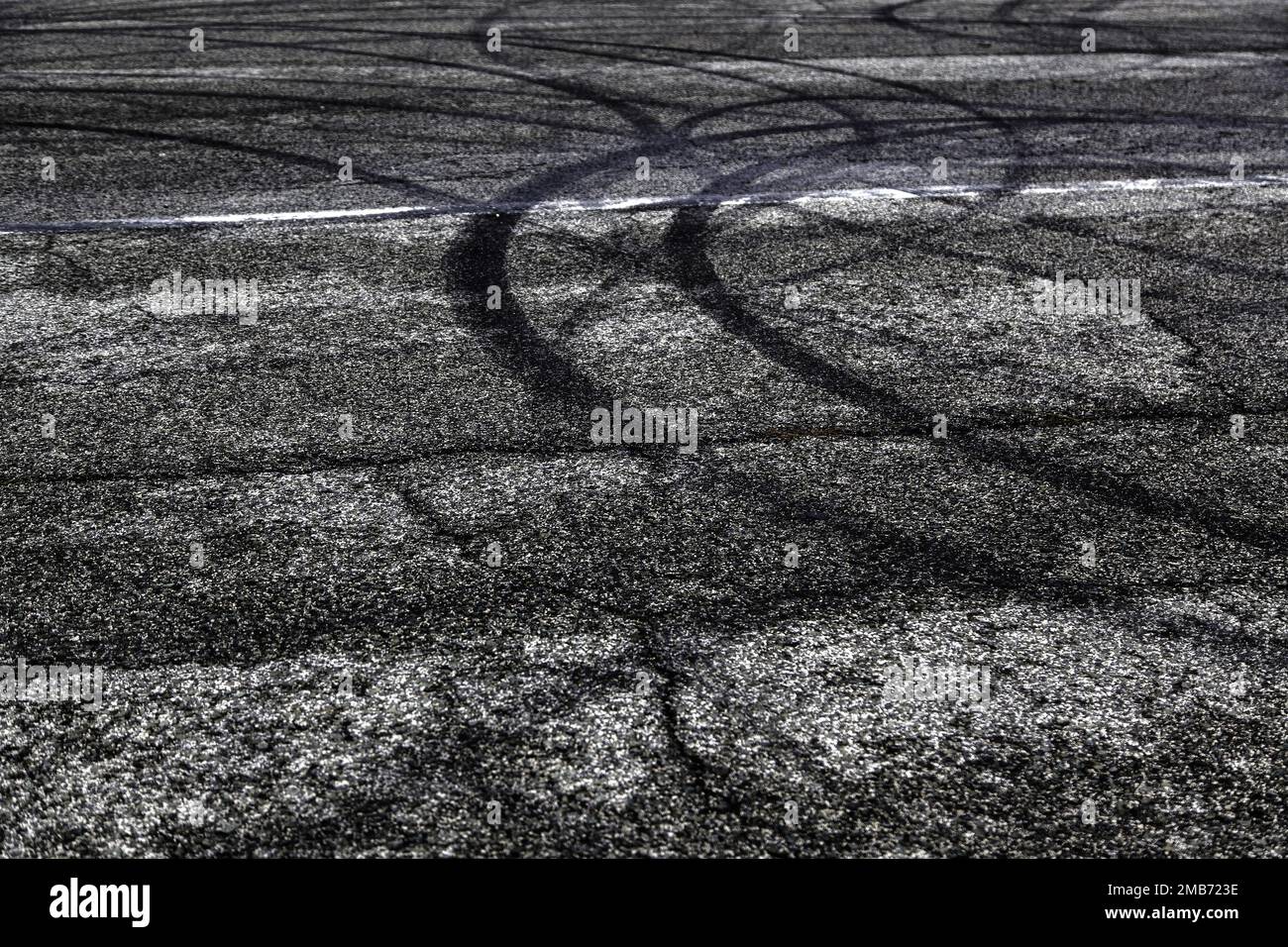 Detail of wheel marks on a mountain road, clandestine car race Stock ...