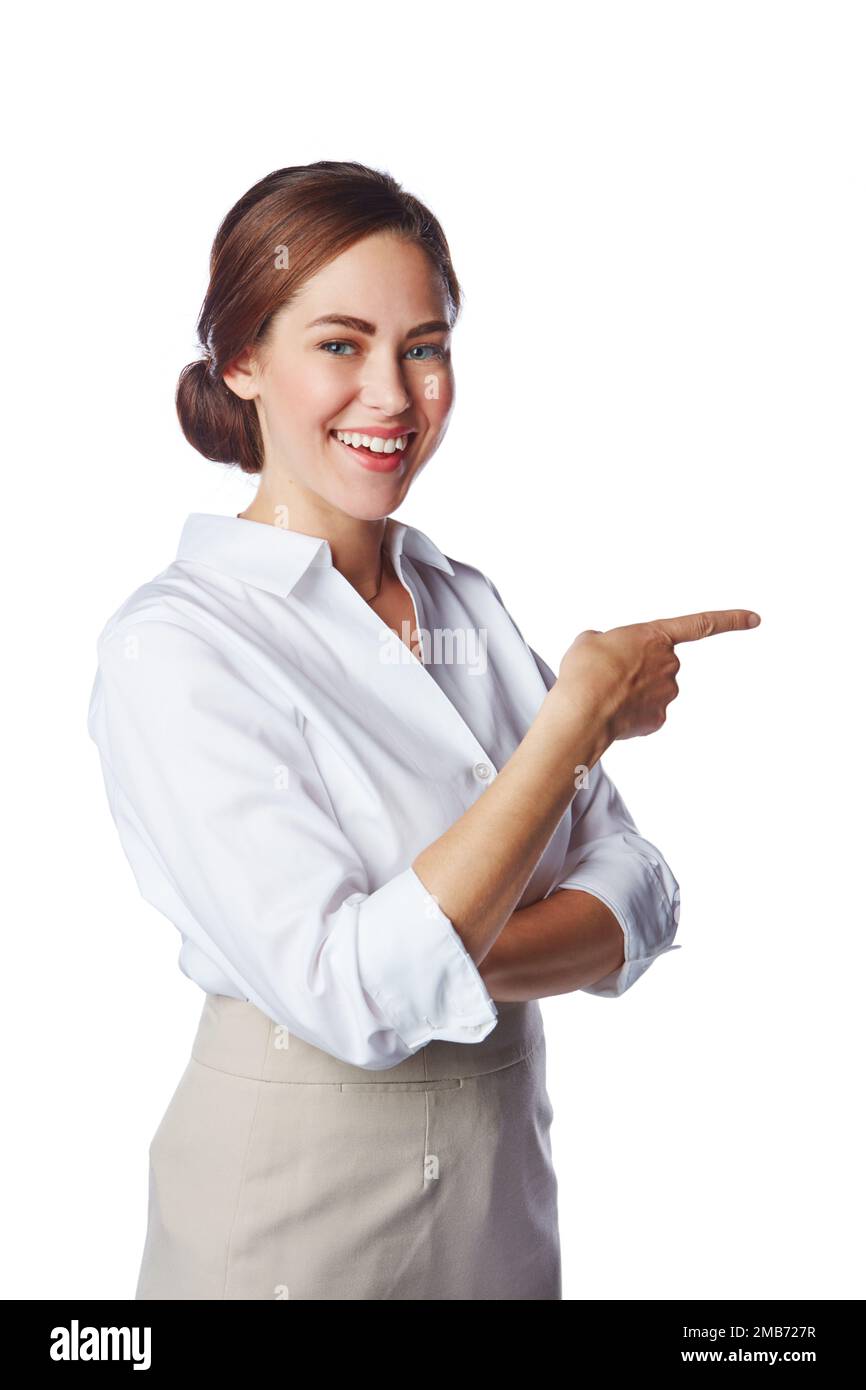 Portrait, pointing and happy woman with finger gesture isolated against ...