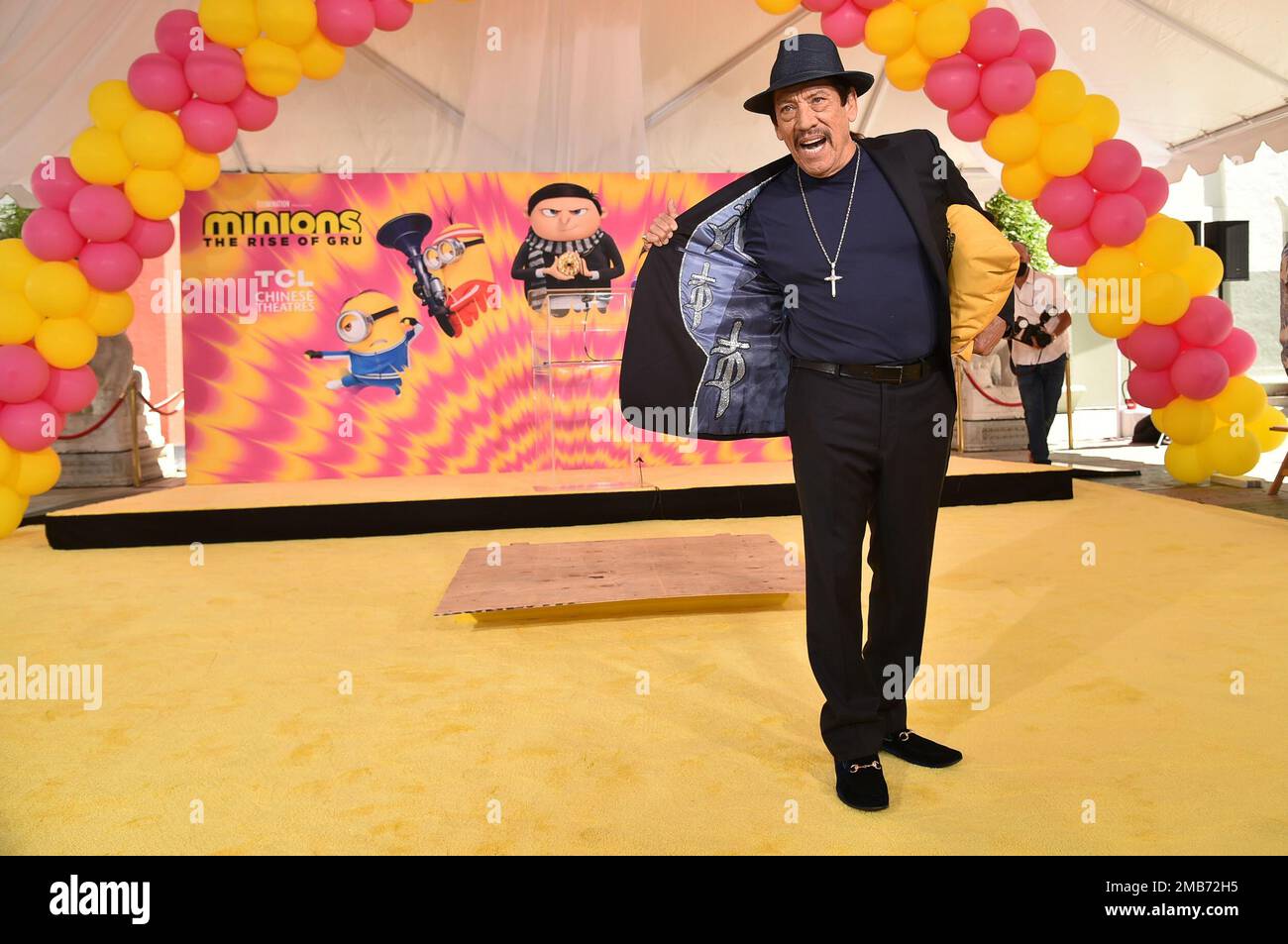 Danny Trejo poses for photos durning a hand and footprint ceremony ...