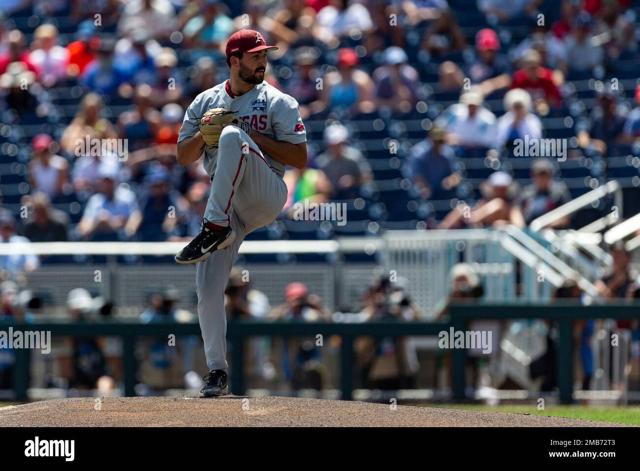 Arkansas starting pitcher Connor Noland (13) throws a pitch in the ...
