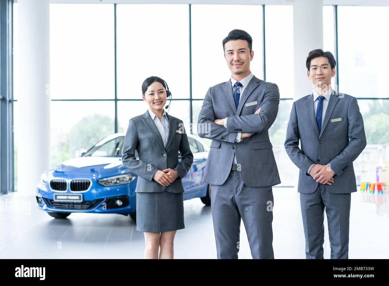 Young business people work in the 4 s shop Stock Photo - Alamy